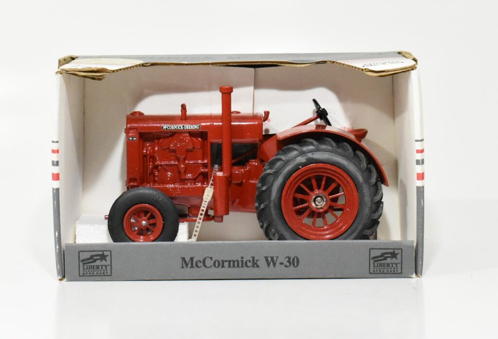 1/16 McCormick W-30 Tractor With Umbrella - Dalton's Farm Toys