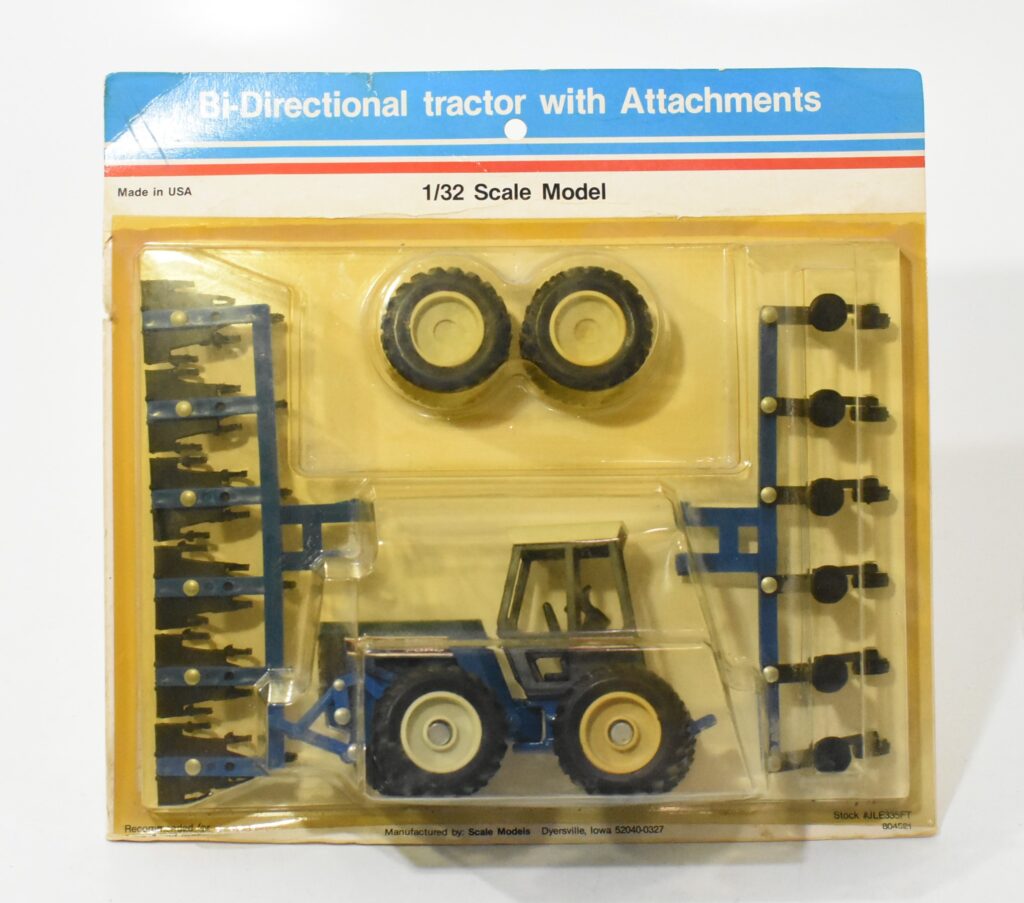 1/32 Ford Bi-Directional Tractor With Attachments - Dalton's Farm Toys