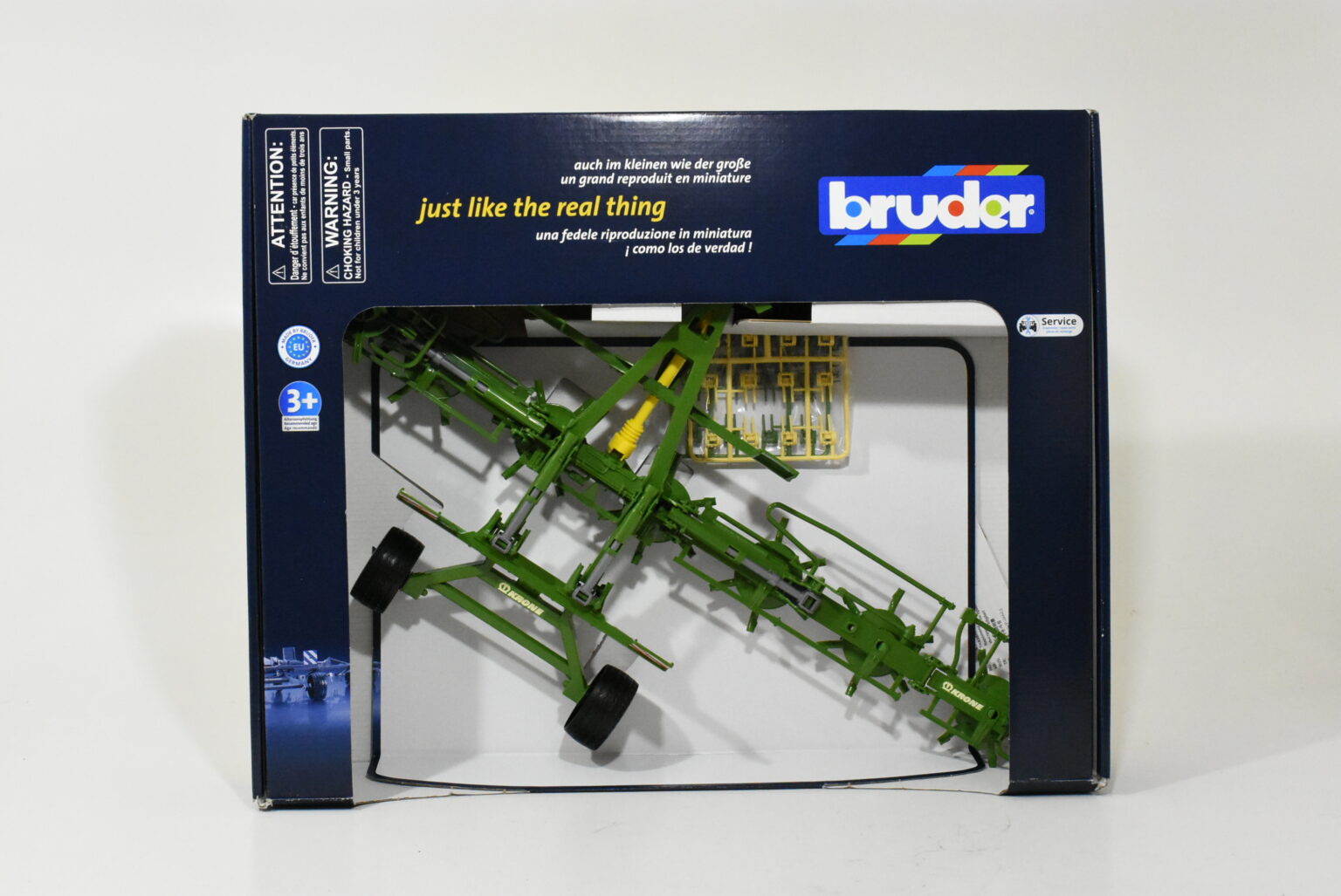 1/16 Krone Trailed Rotary Hay Tedder By Bruder - Dalton's Farm Toys