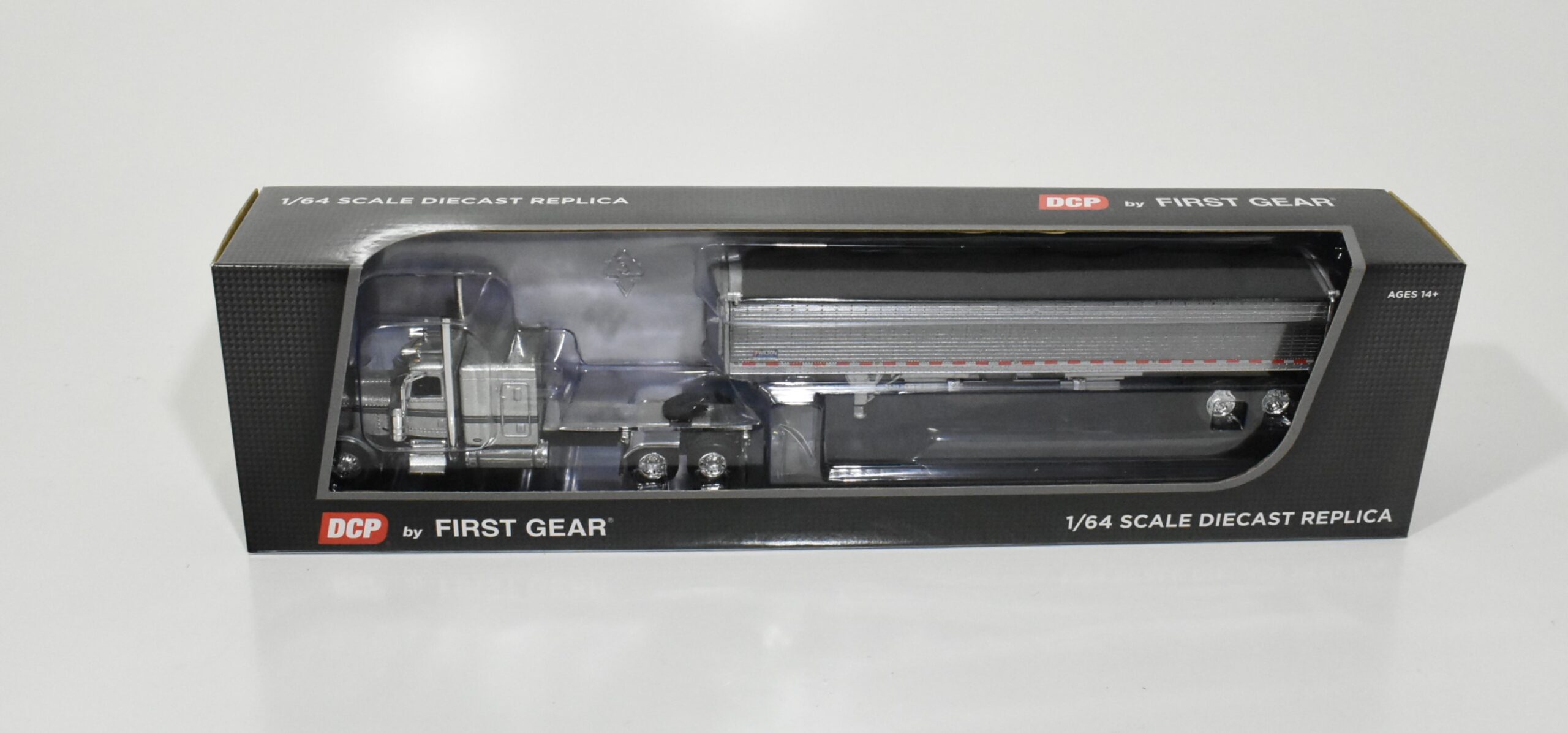 1/64 Silver Peterbilt 389 Semi With 63" Flat Top Sleeper And Gun Metal ...