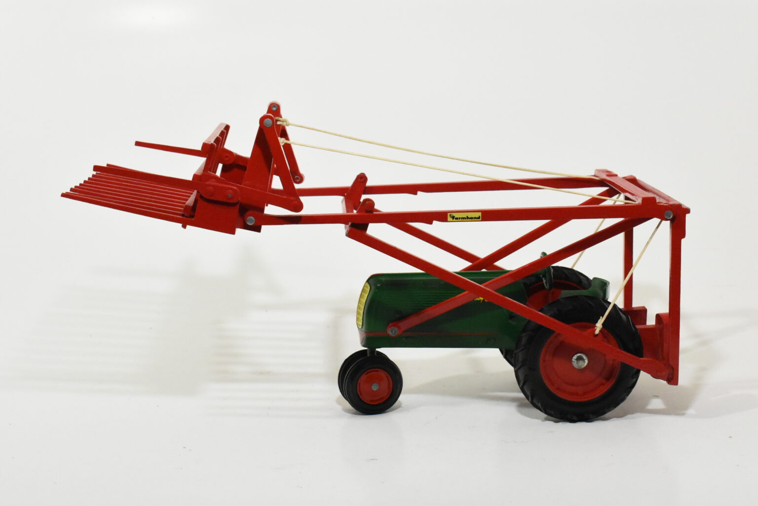 1/16 Oliver 70 Row Crop Tractor With Farmhand Hay Loader - Dalton's ...